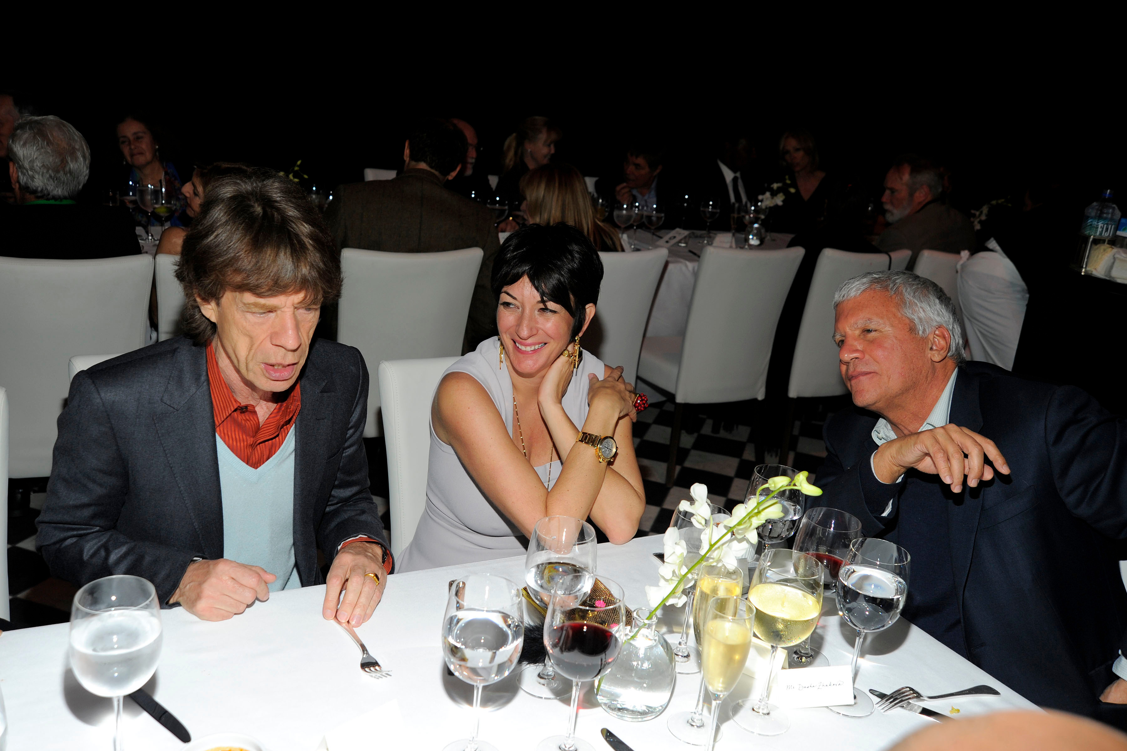 A pre-arrest Ghislaine Maxwell with some of her famous friends